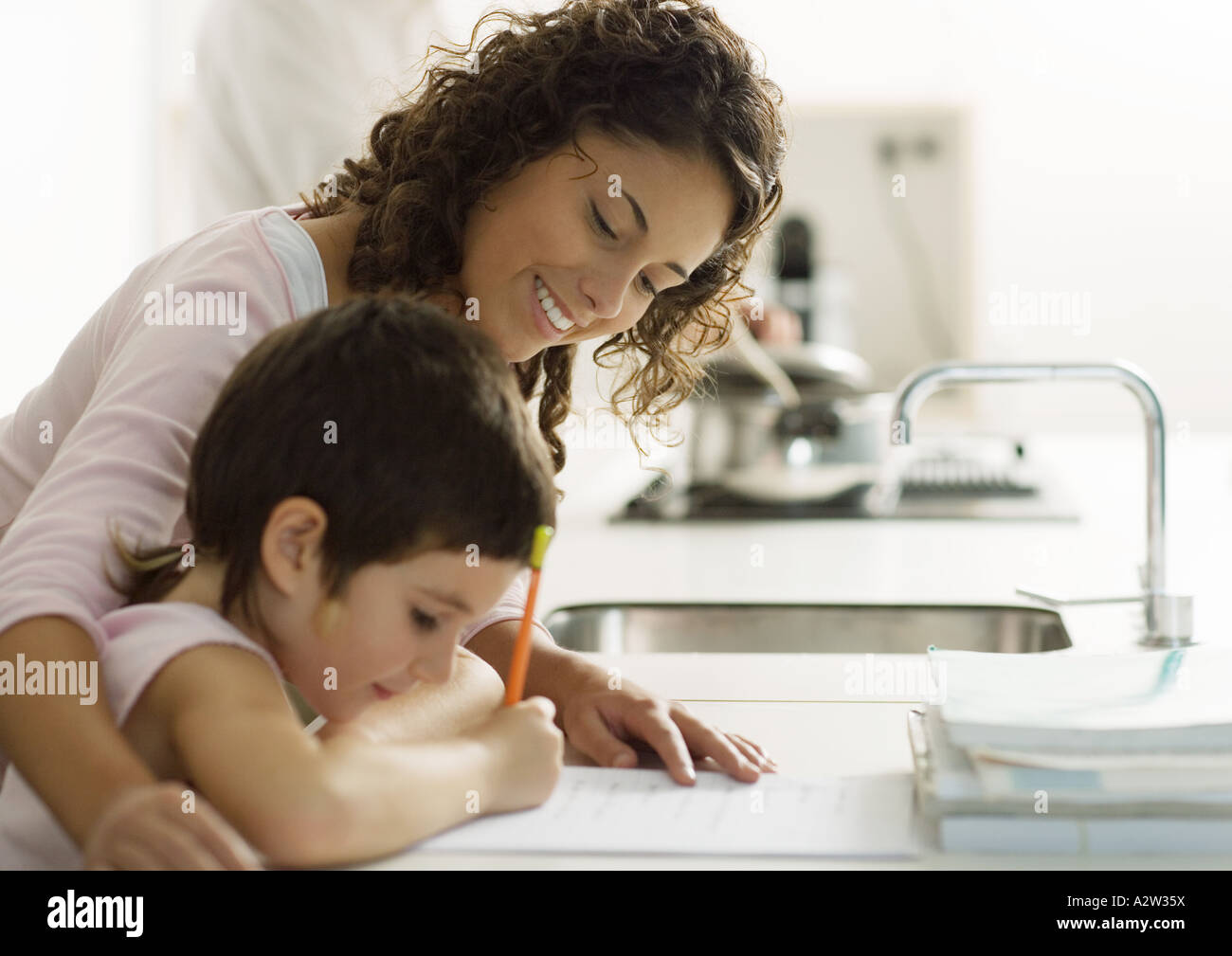 Helping kids learn to write hi-res stock photography and images - Alamy