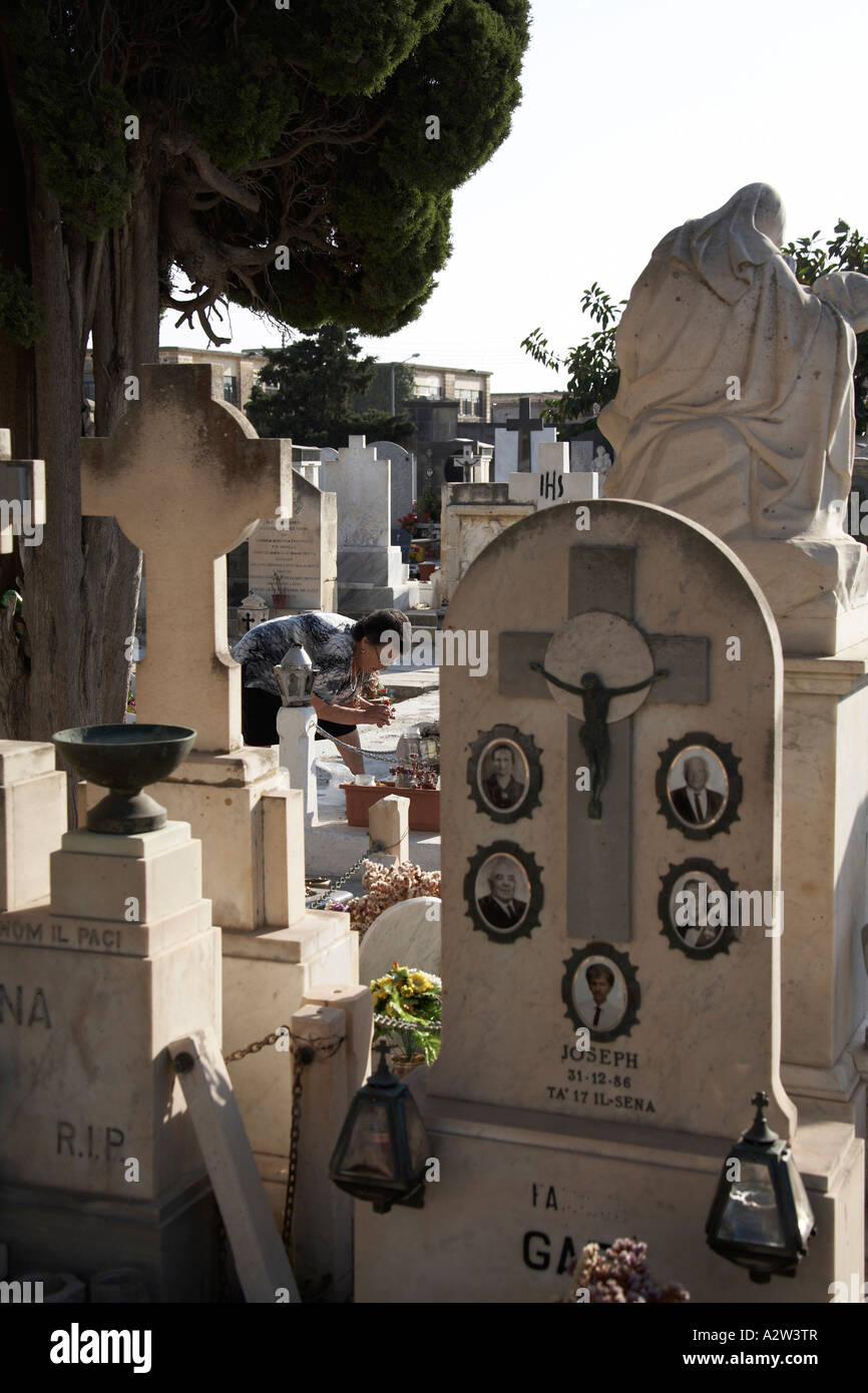 Graves and tombstones in Christian cemetery in Zejtun town on ...