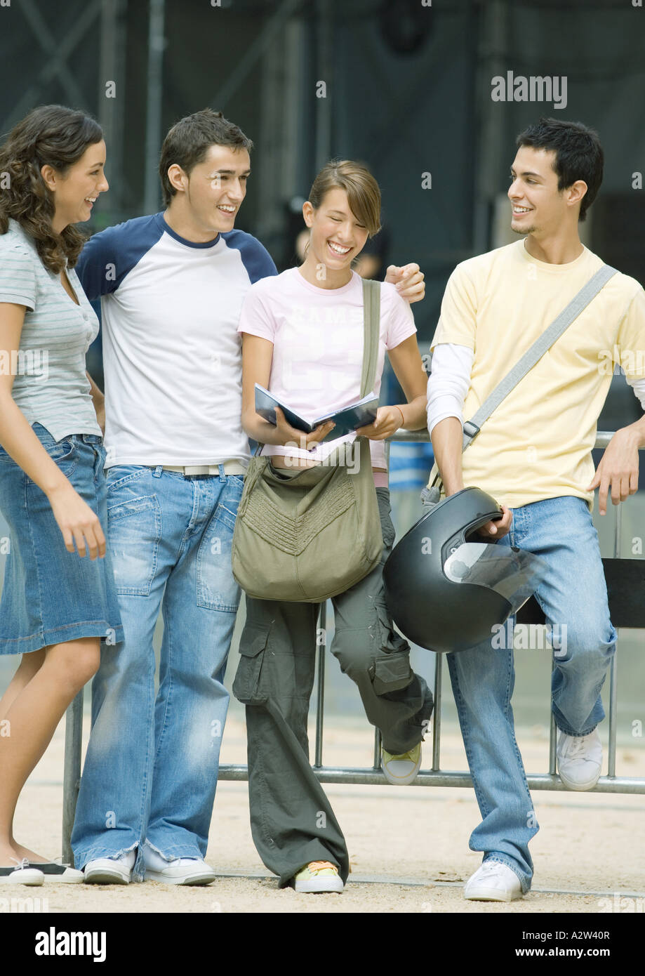 Teens standing outdoors, talking Stock Photo - Alamy Teens standing outdoors, talking Stock Photo - Alamy