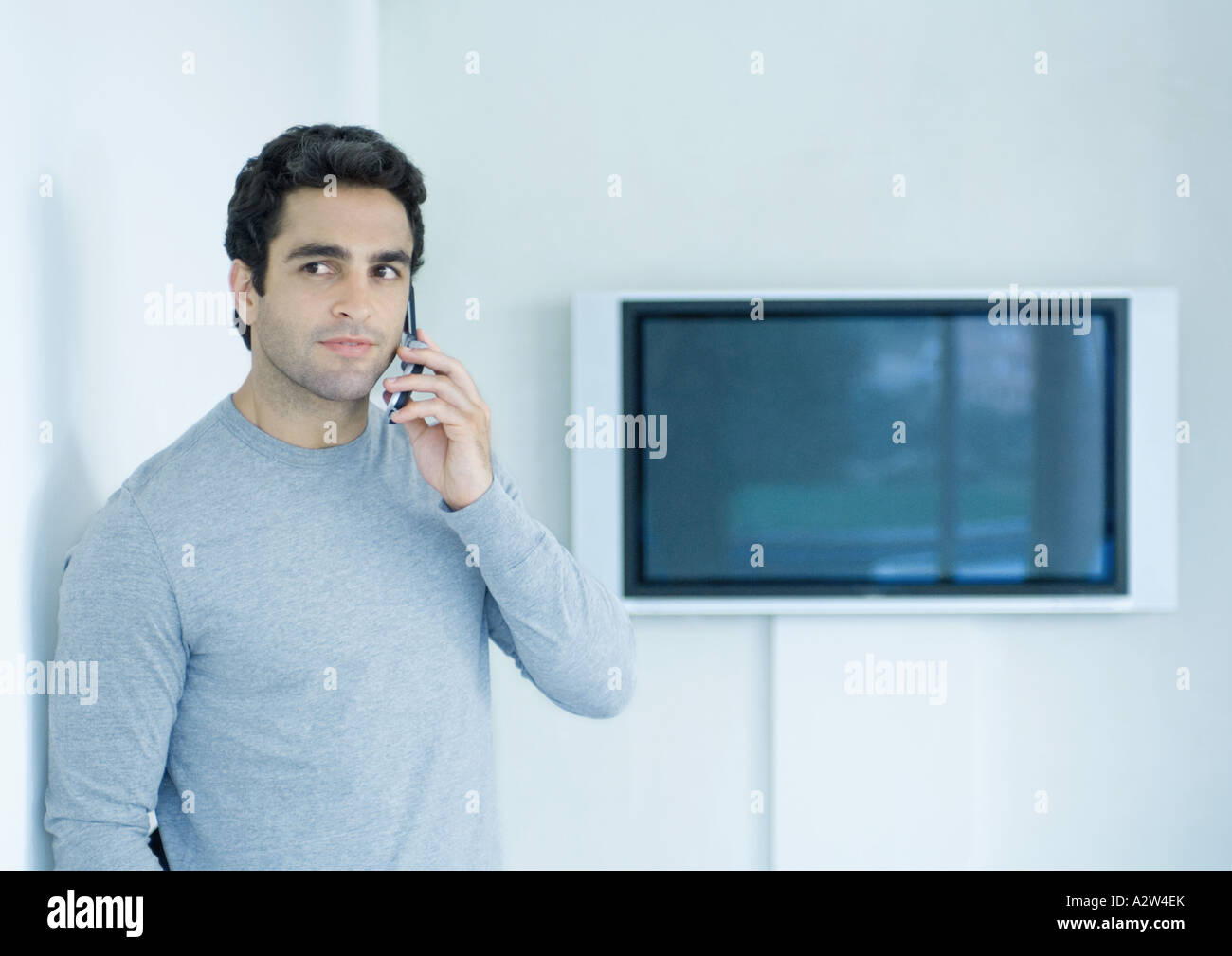 Man turning on tv using hi-res stock photography and images - Alamy