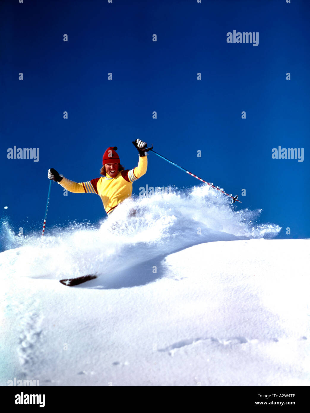 Ski Expert Steve Maw bursts through powder snow at Sun Valley in Idaho ...