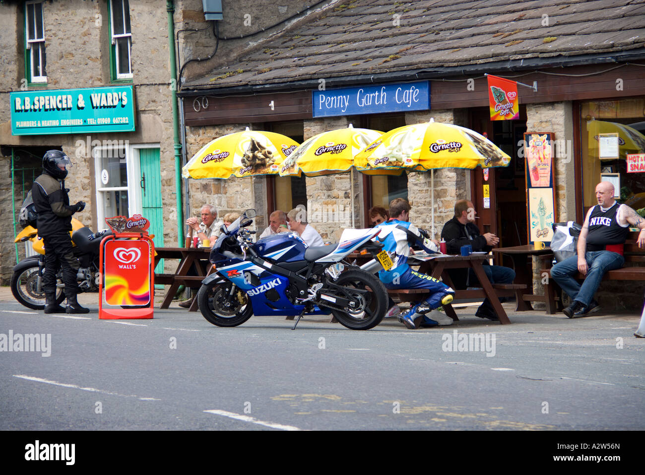 Motorcycles Bikers Resting Outside Of A Cafe Eating Drinking Talking ...
