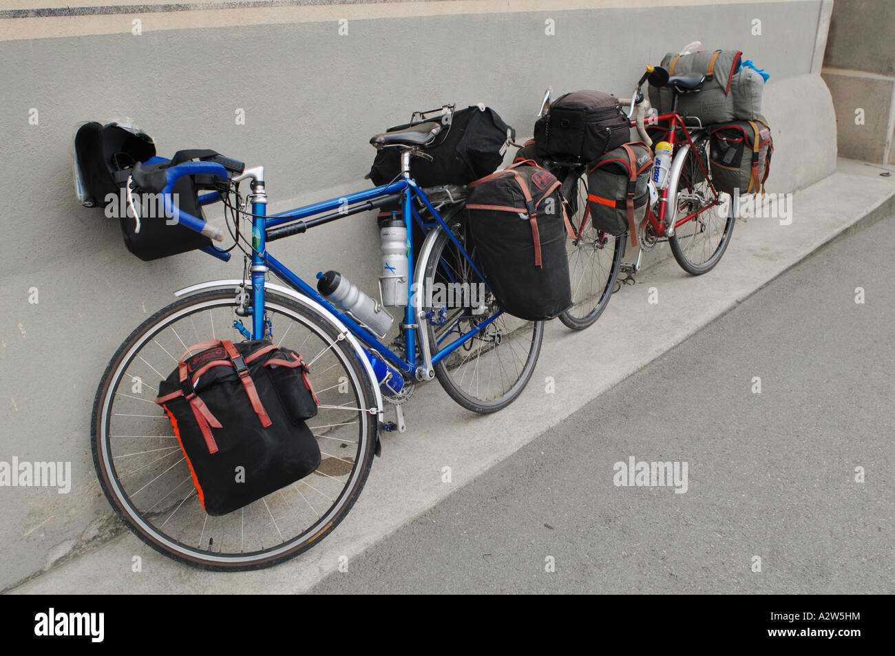 Touring bicycles loaded with camping luggage in Switzerland Stock Photo ...