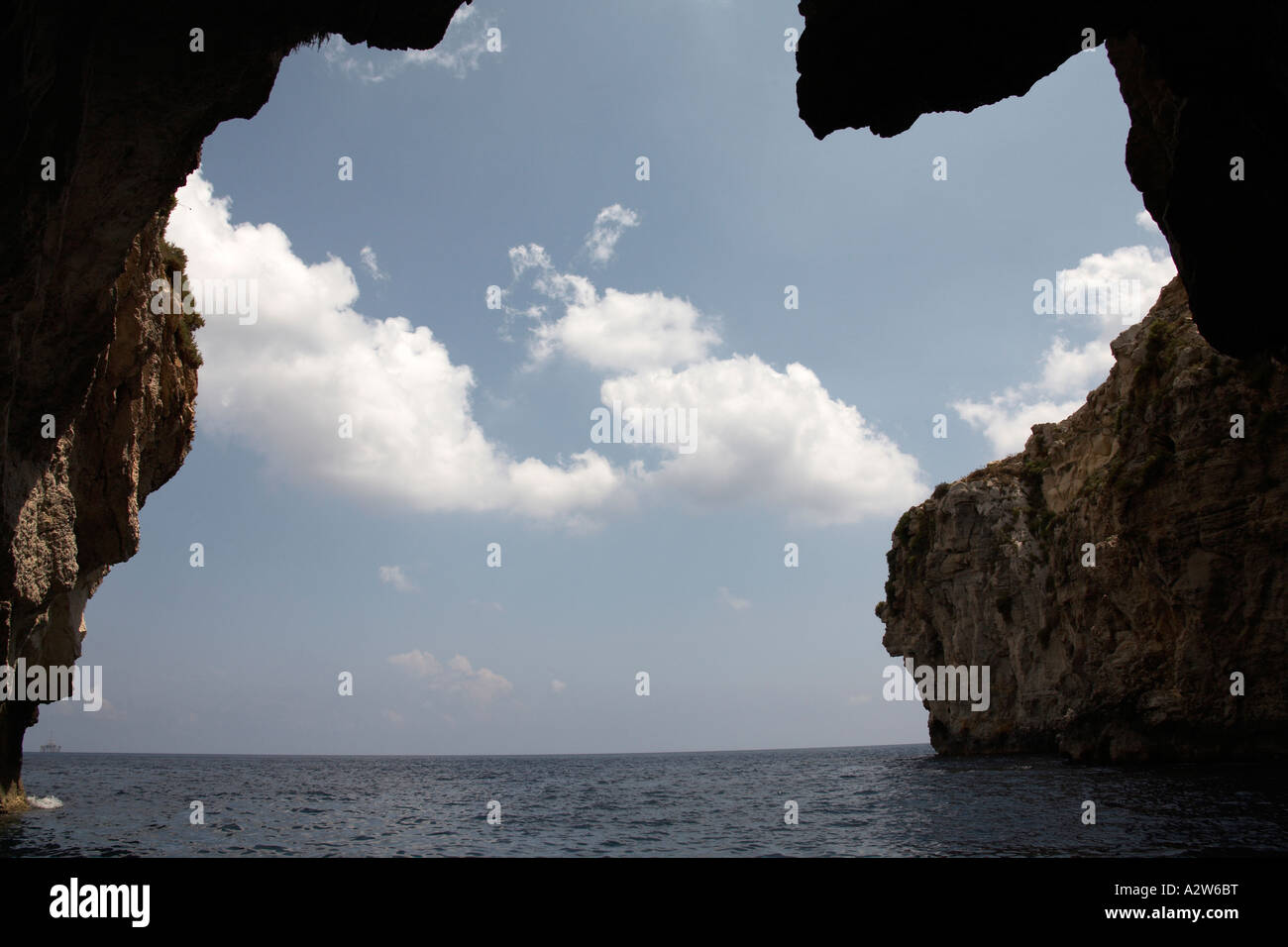 Rock formations in limestone sea cliffs at the Blue Gotto cave Malta ...