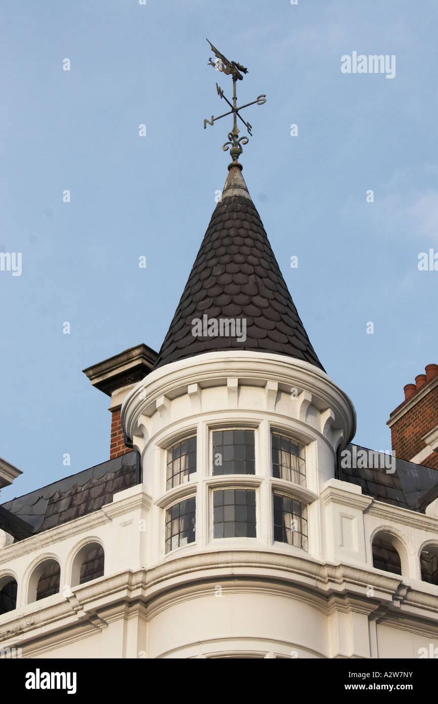 Dragon weather vane on conical roof of corner building on St John s ...