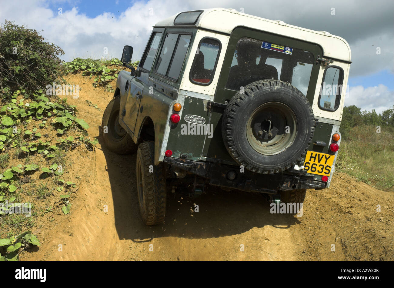 Land Rover on steep hill Stock Photo - Alamy