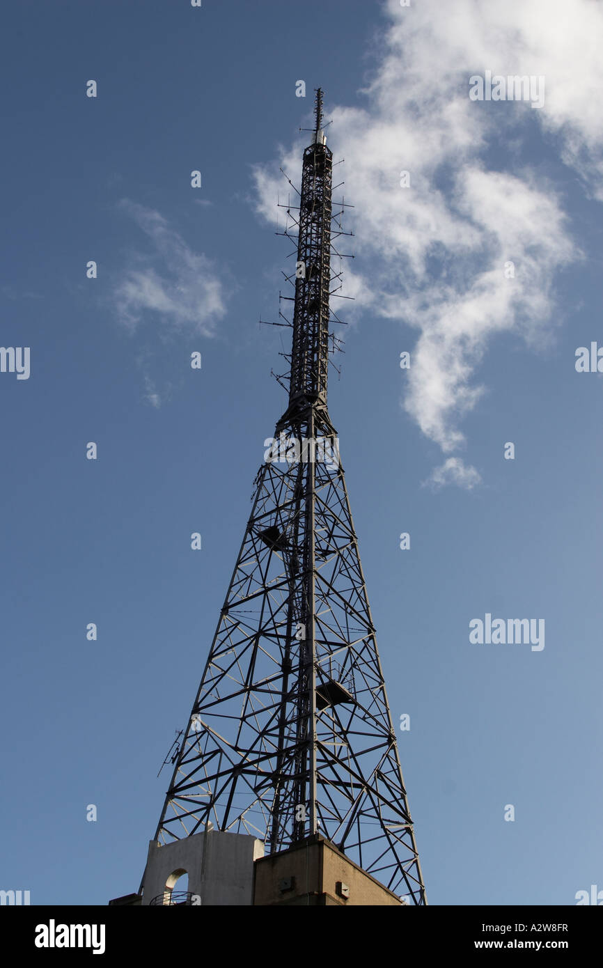 Alexandra Palace BBC TV television transmiter mast against blue sky ...
