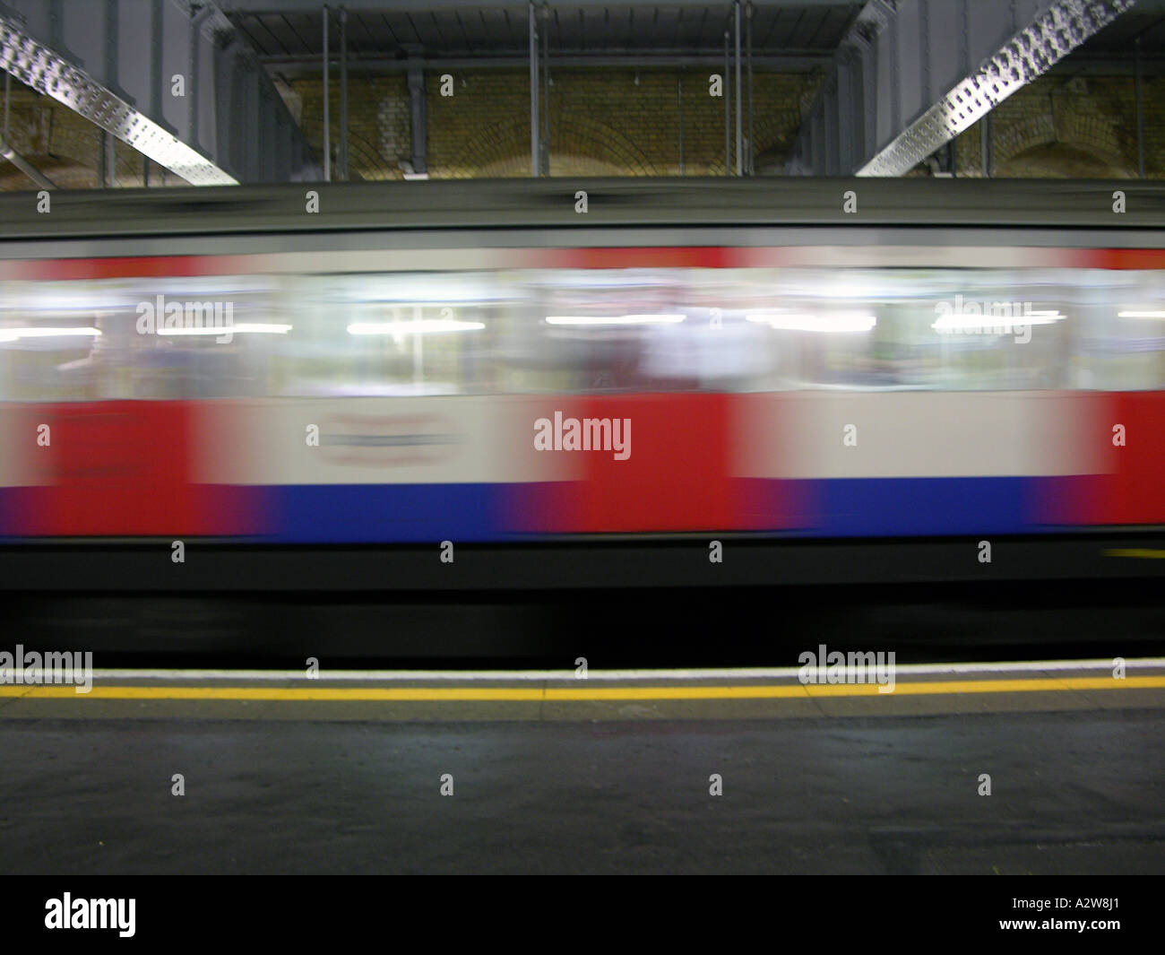 A speeding train in the London tube Stock Photo - Alamy