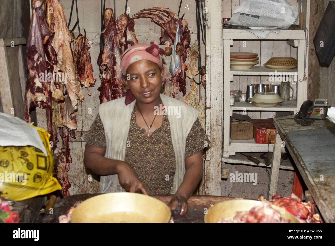 Woman selling meat in butchers shop Lalibela Ethiopia Africa Stock ...