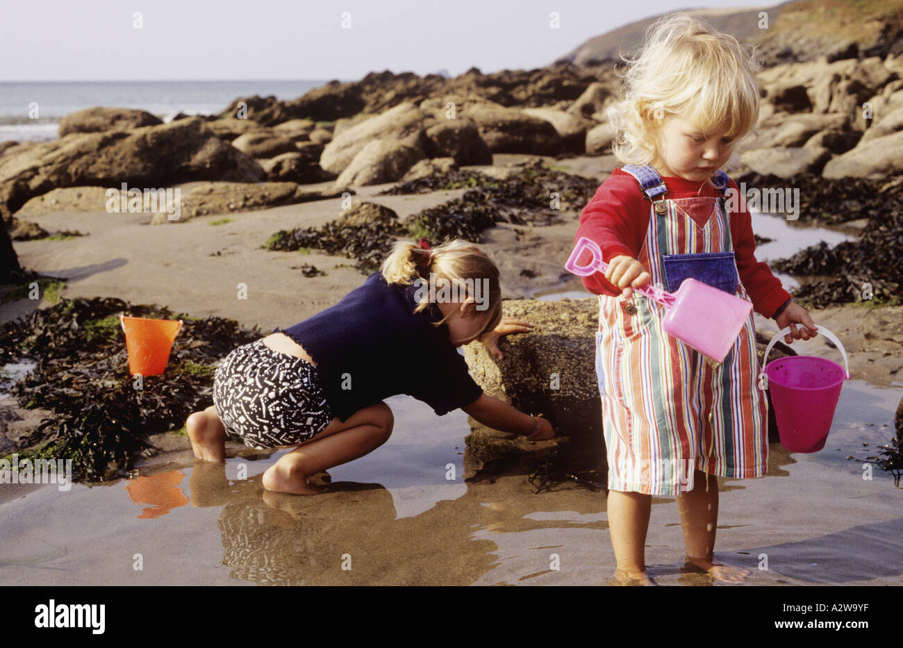 Kids in rock pool uk hi-res stock photography and images - Alamy