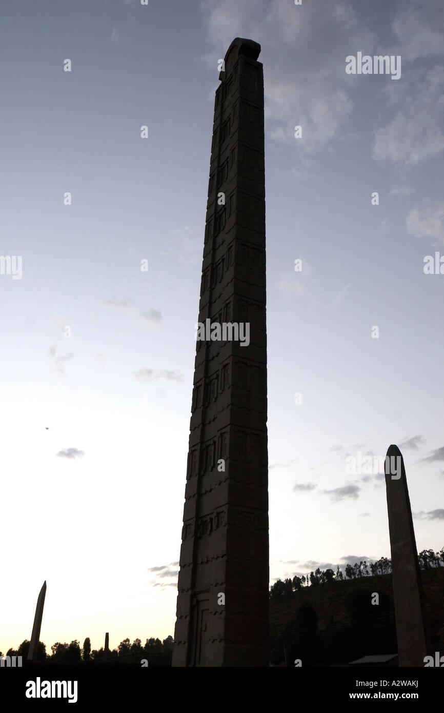 Solid stone carved stelae in silhouette against the sunset Aksum or ...