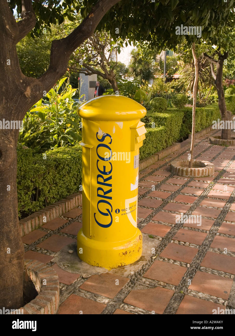 Typical Spanish yellow post box in Plaza de los Naranjos Marbella ...