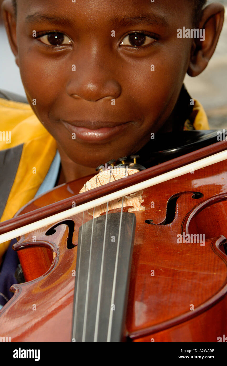 young African boy playing violin Stock Photo - Alamy