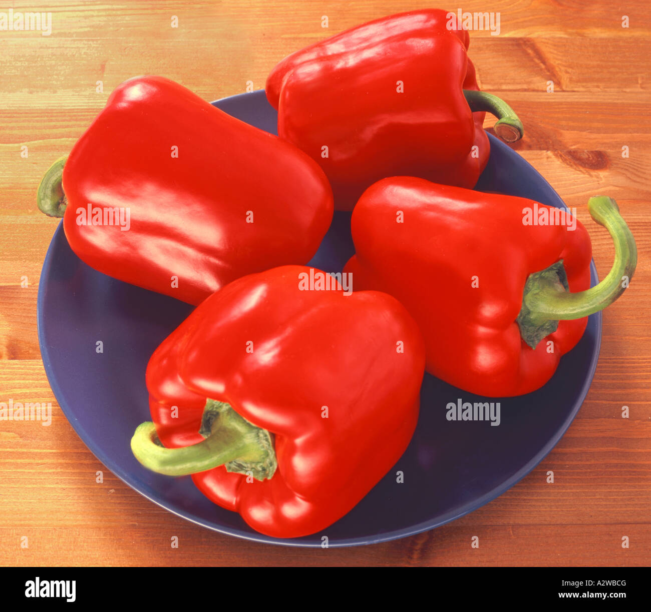 Four red papricas Stock Photo - Alamy