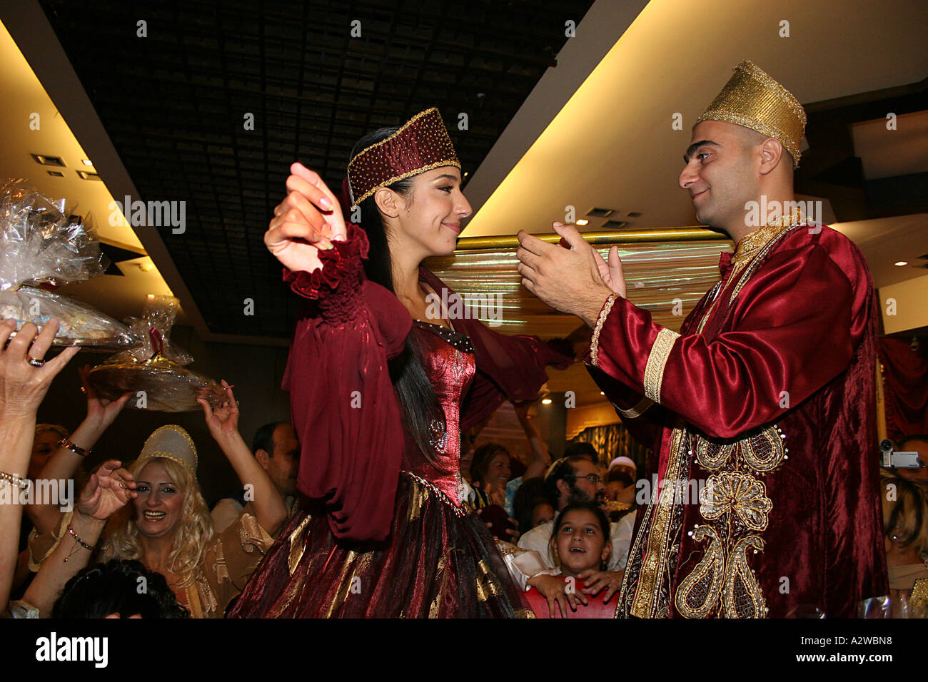 The bride and groom to be at a henna ceremony Stock Photo - Alamy