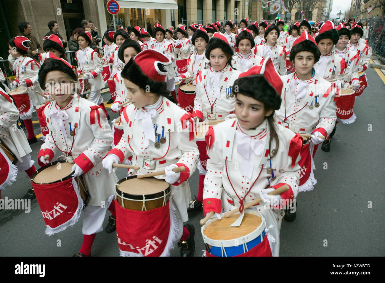 Lines of Basque children wearing period costume parade during La ...
