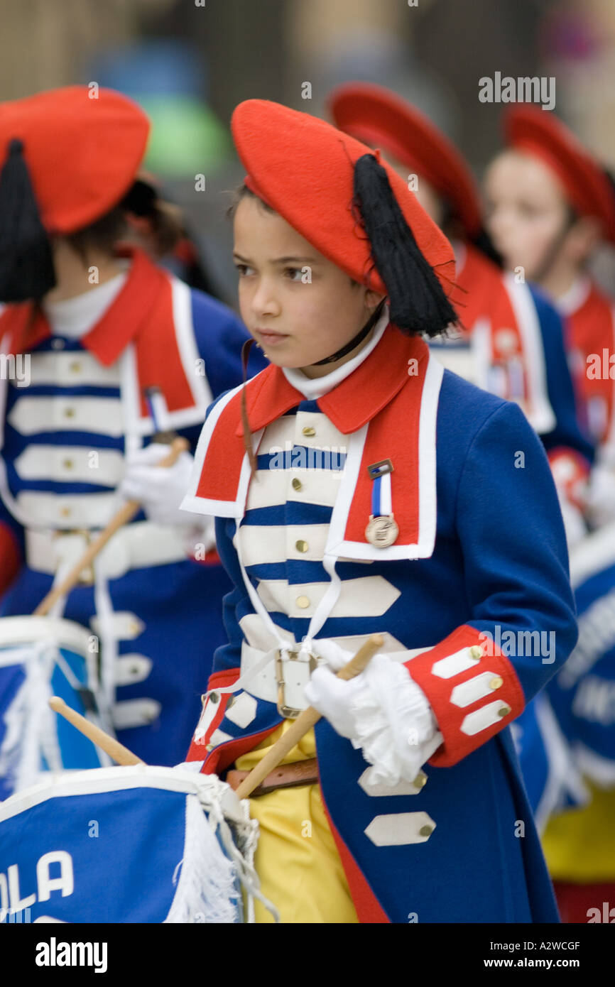Young Basque children wearing red berets during La Tamborrada, Donostia ...