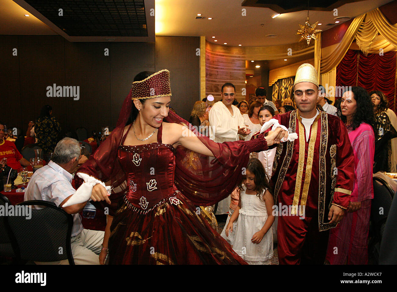 The bride and groom to be at a henna ceremony Stock Photo - Alamy