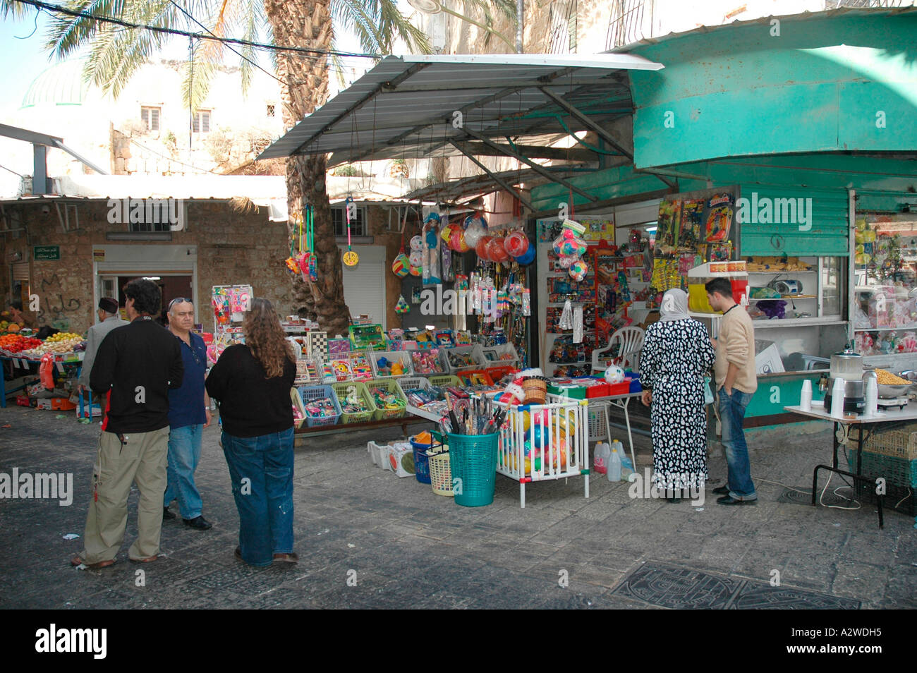 People in the market in the narrow streets of old Akko Stock Photo - Alamy