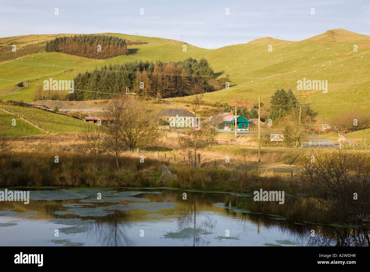 Llywernog Silver Lead Mine Museum and pond in rural valley in Plynlimon ...