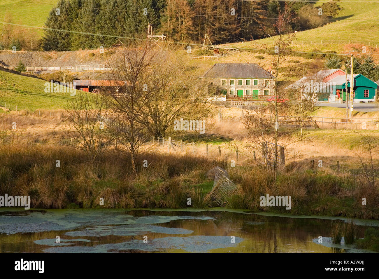 Llywernog Silver Lead Mine Museum and pond in rural valley in Plynlimon ...