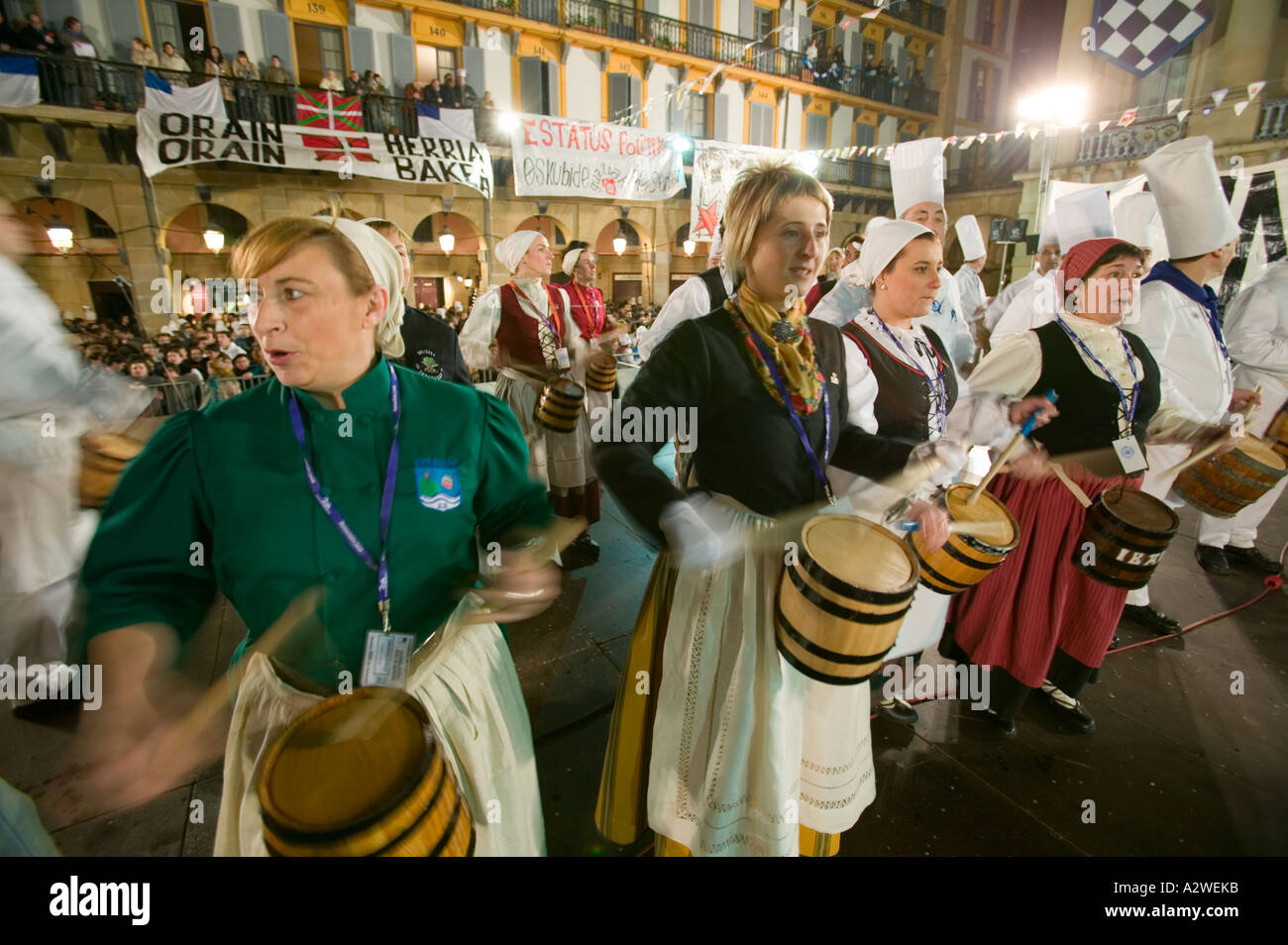 Basque men and women in traditional dress during opening ceremony of ...