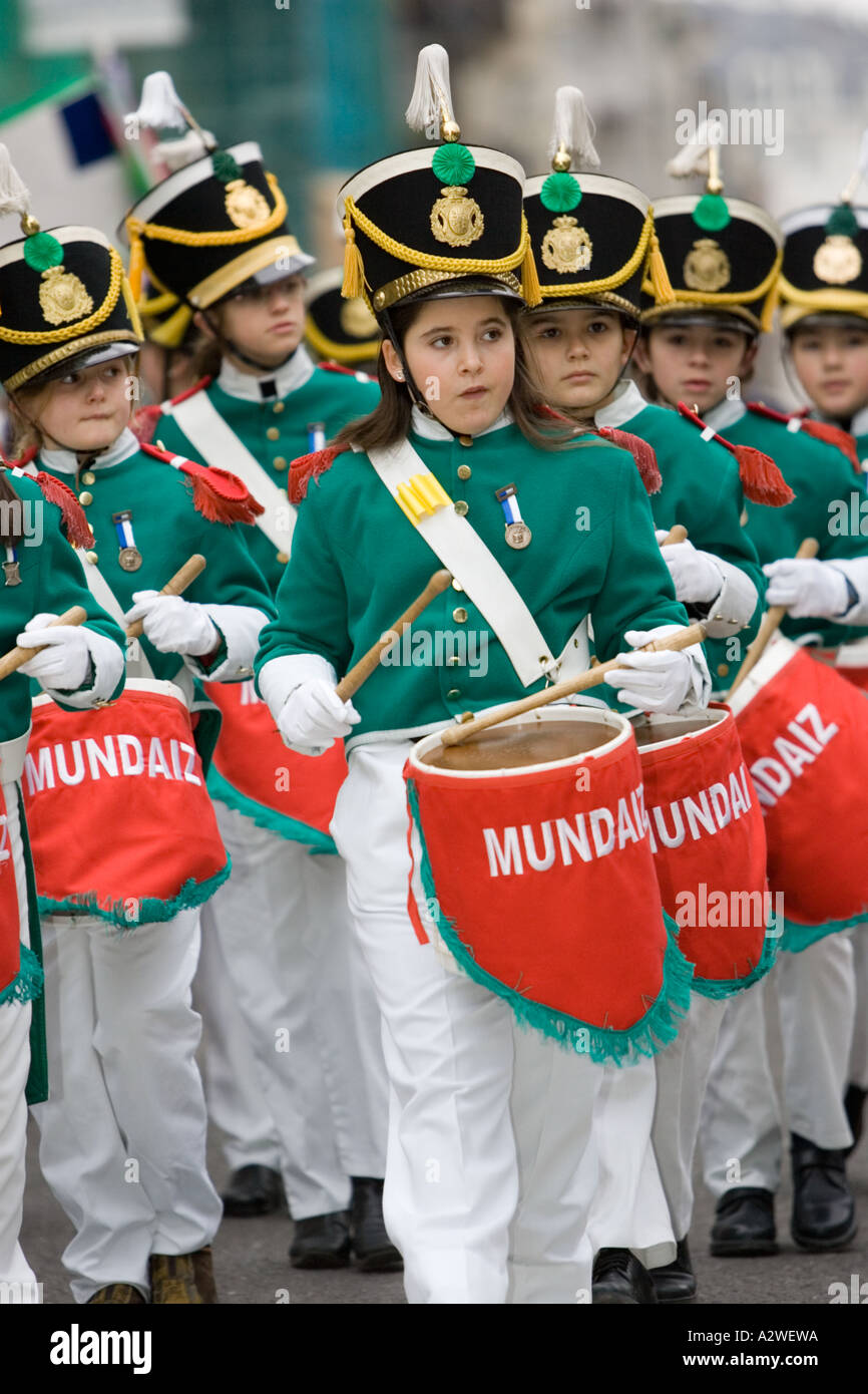 Basque children in military uniforms parade through the streets of ...