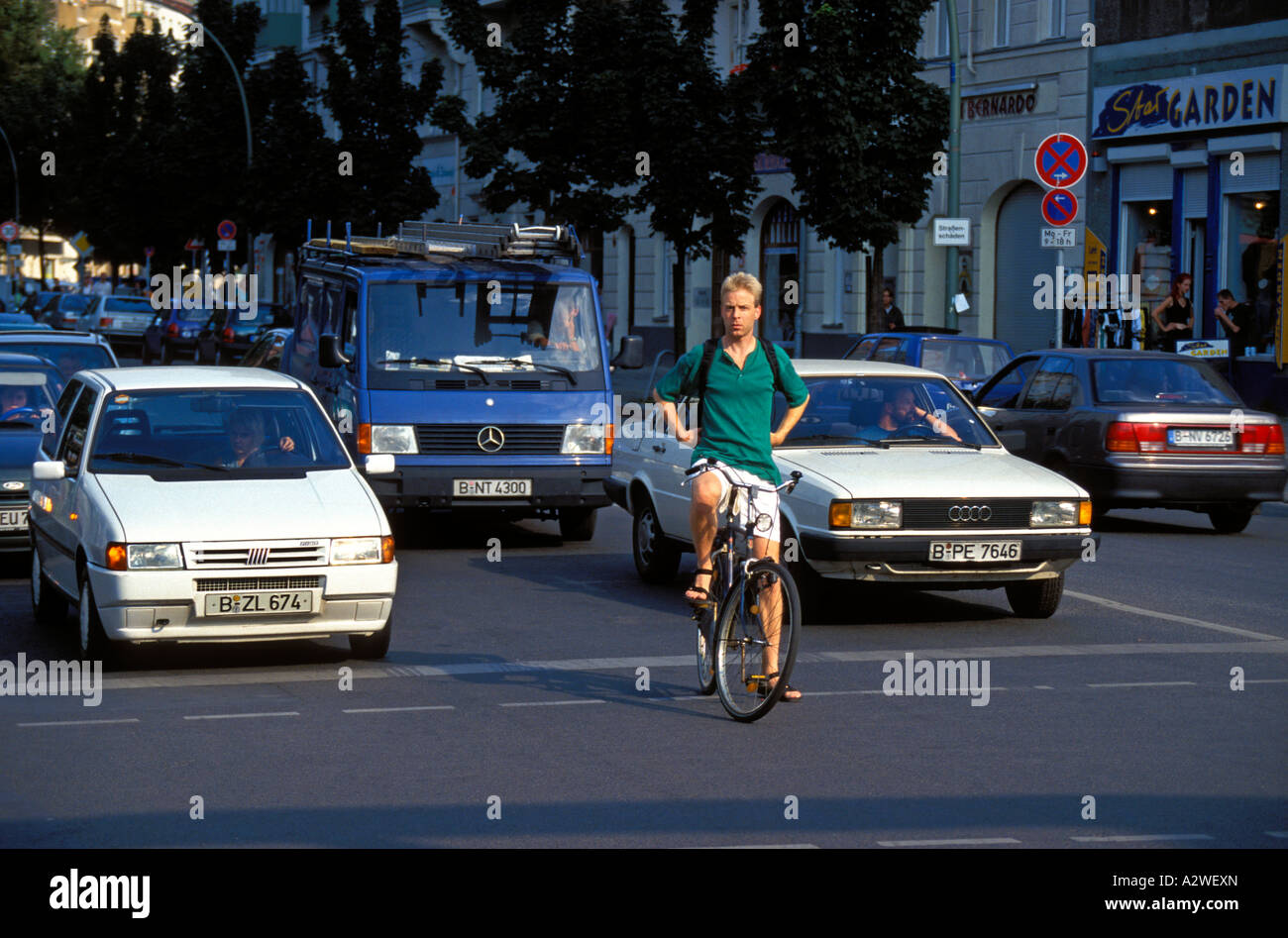 Germany Berlin a cyclist waiting at an intersection Stock Photo - Alamy