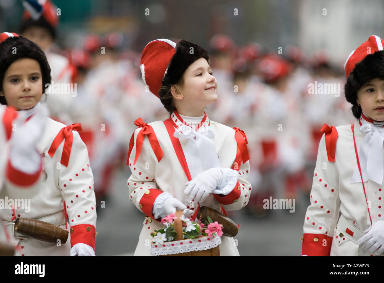 Basque children parade in uniform during La Tamborrada, Donostia San ...