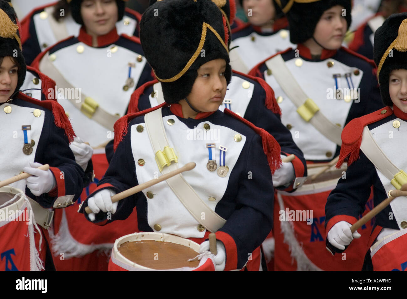 Basque children parade in uniform during La Tamborrada, Donostia San ...