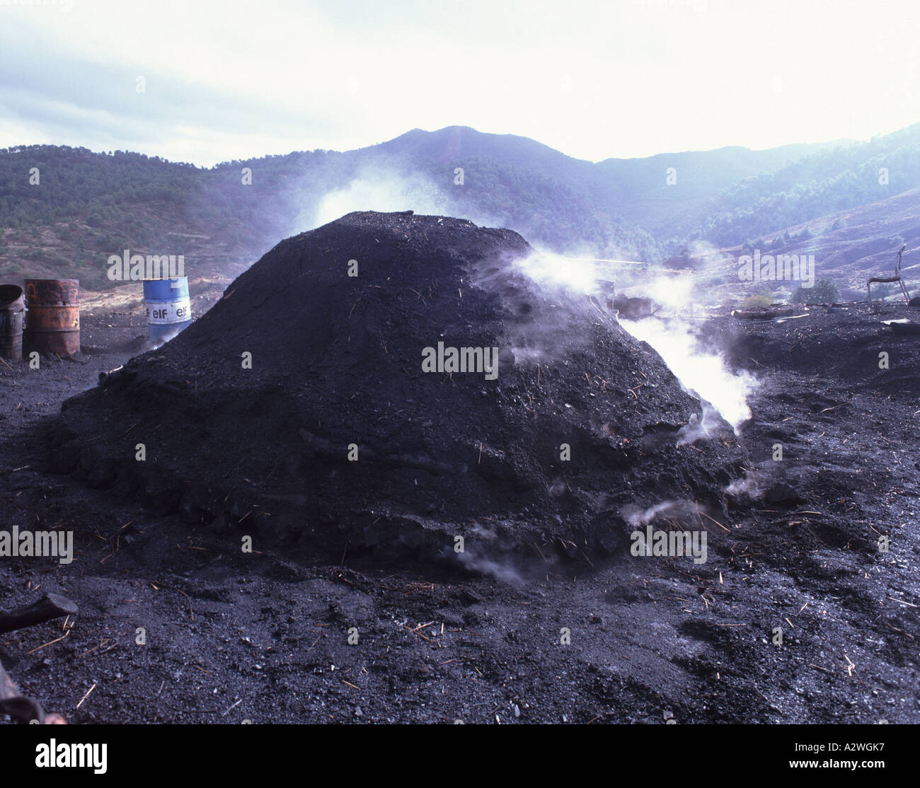The traditional way of making of Charcoal, this method is still used in ...