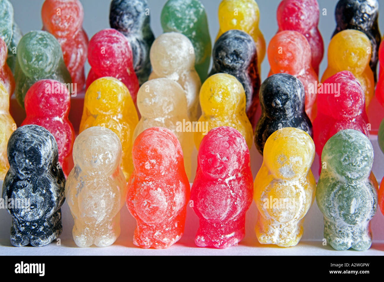 Jelly baby sweets standing in rows Stock Photo - Alamy