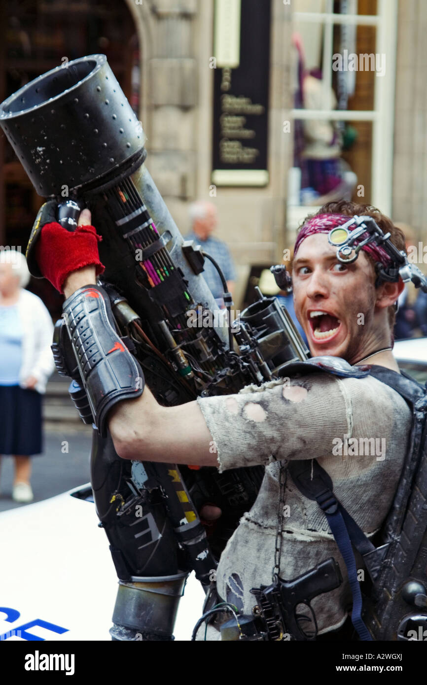Mime artist with a large gun at the Edinburgh festival fringe Royal ...