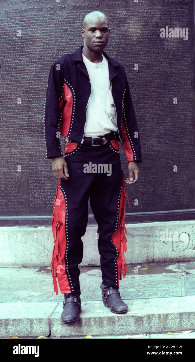 Young man standing Stock Photo - Alamy