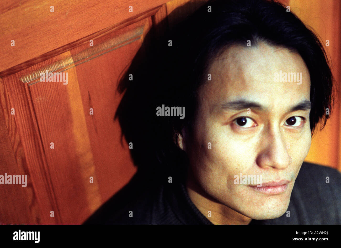 Portraits photography colour asian man hi-res stock photography and ...