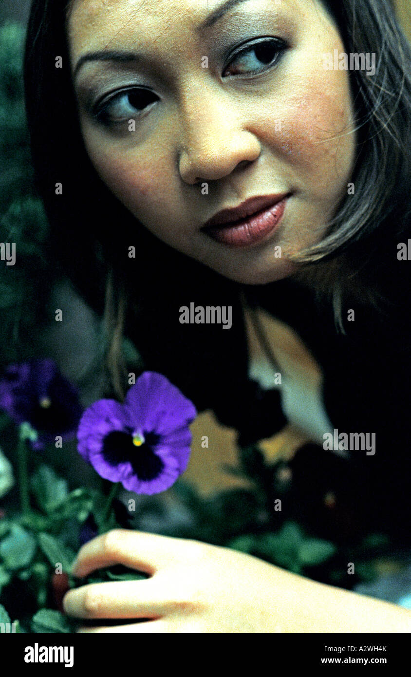 Young woman contemplating Stock Photo - Alamy