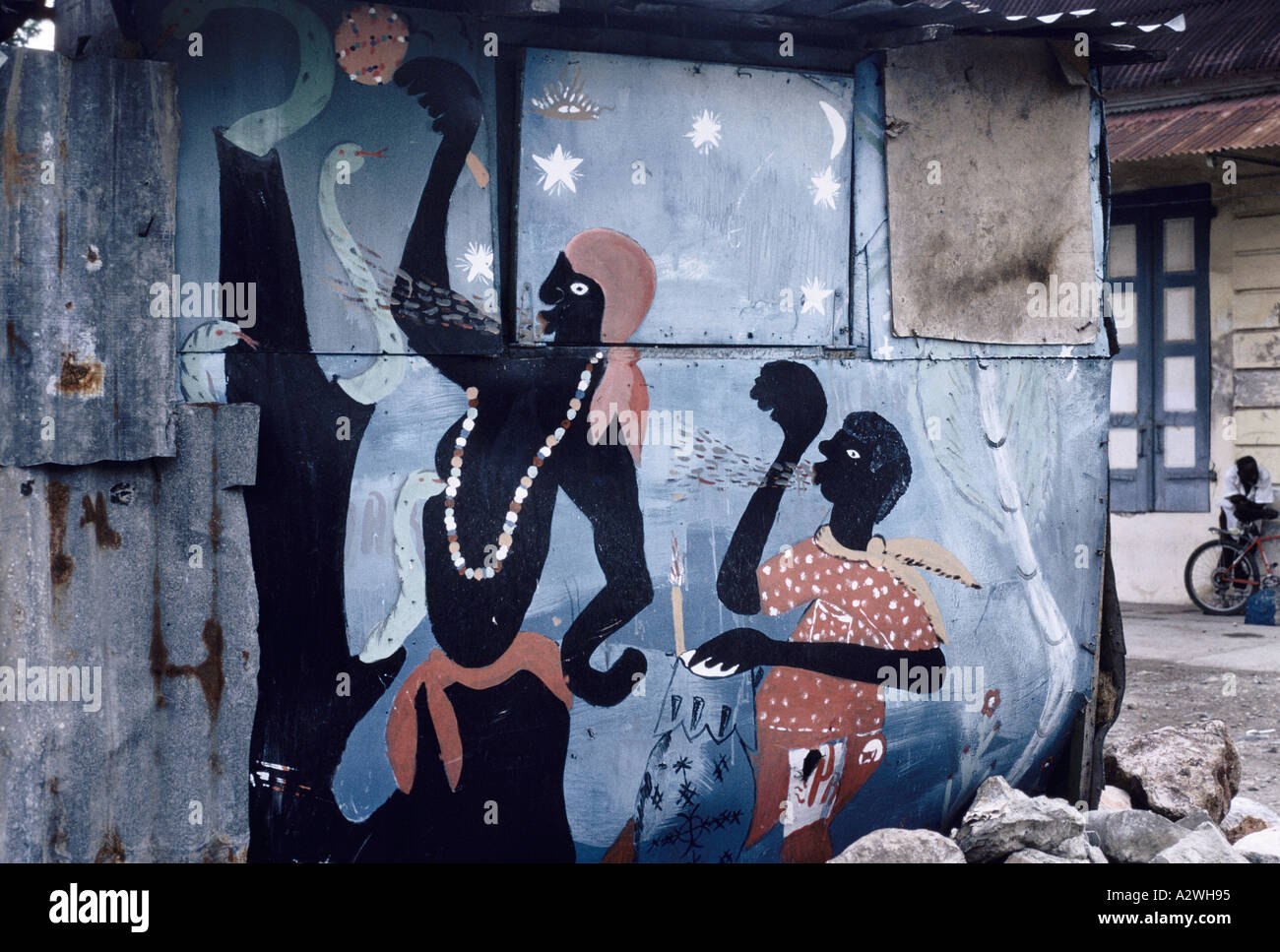 Haiti. Cap Hatien. Ramshackle huts with voodoo painting 1992 Stock ...