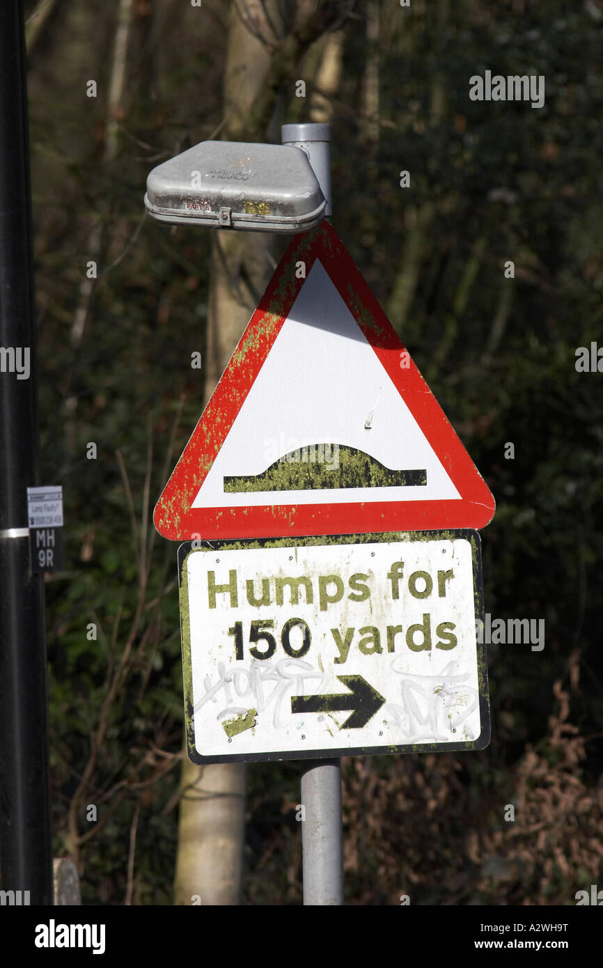 Old Humps sign in bad condition with mildew and graffiti in London N10 ...