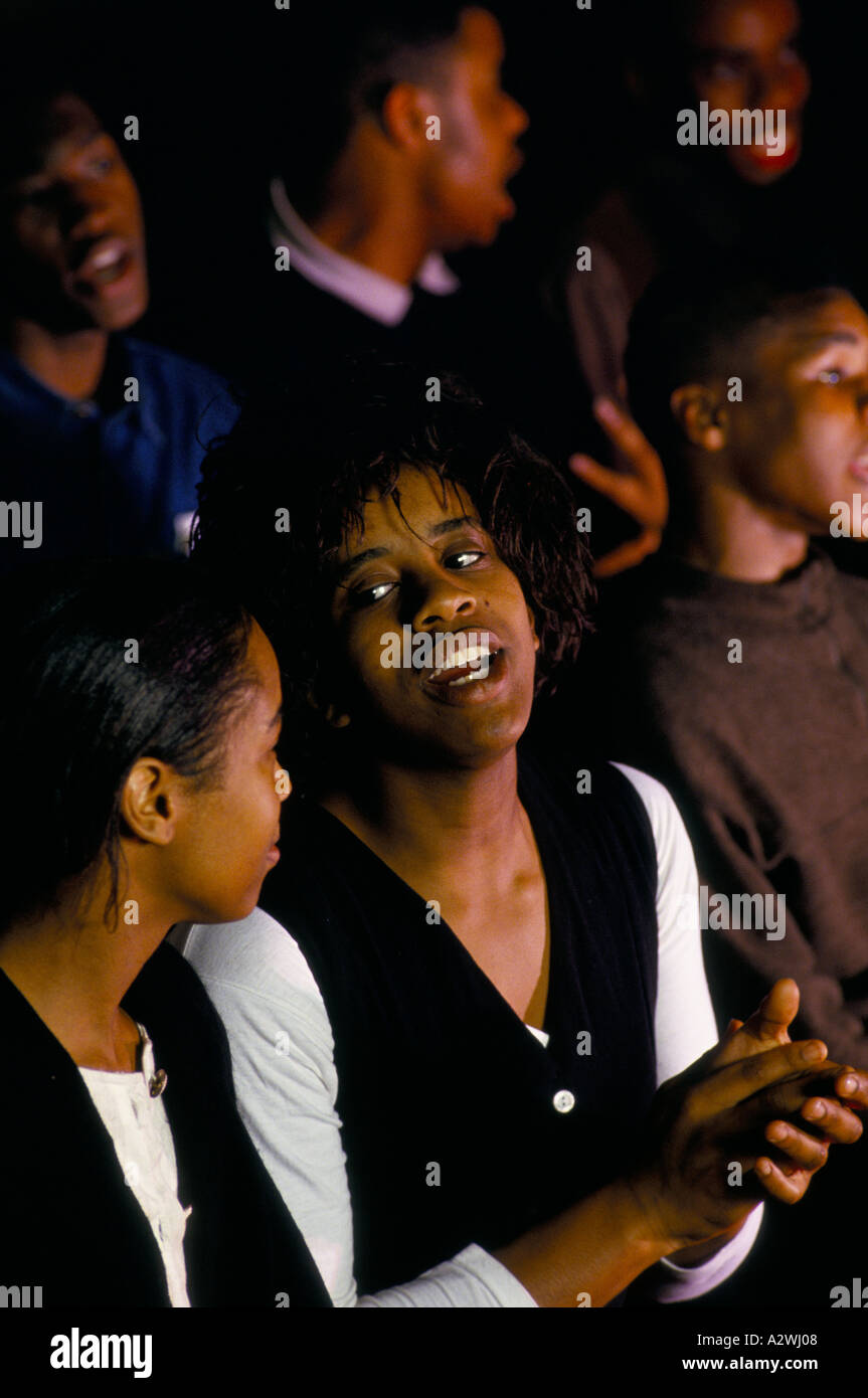 male female members of muswel hill gospel choir clapping hands singing ...