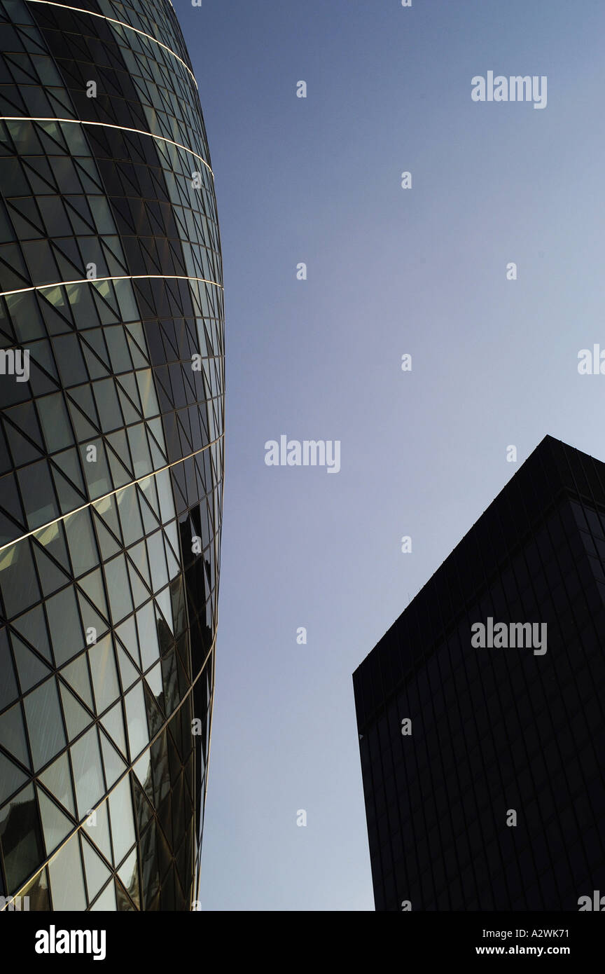 detail of the swiss rea tower known as the gherkin next to the ...