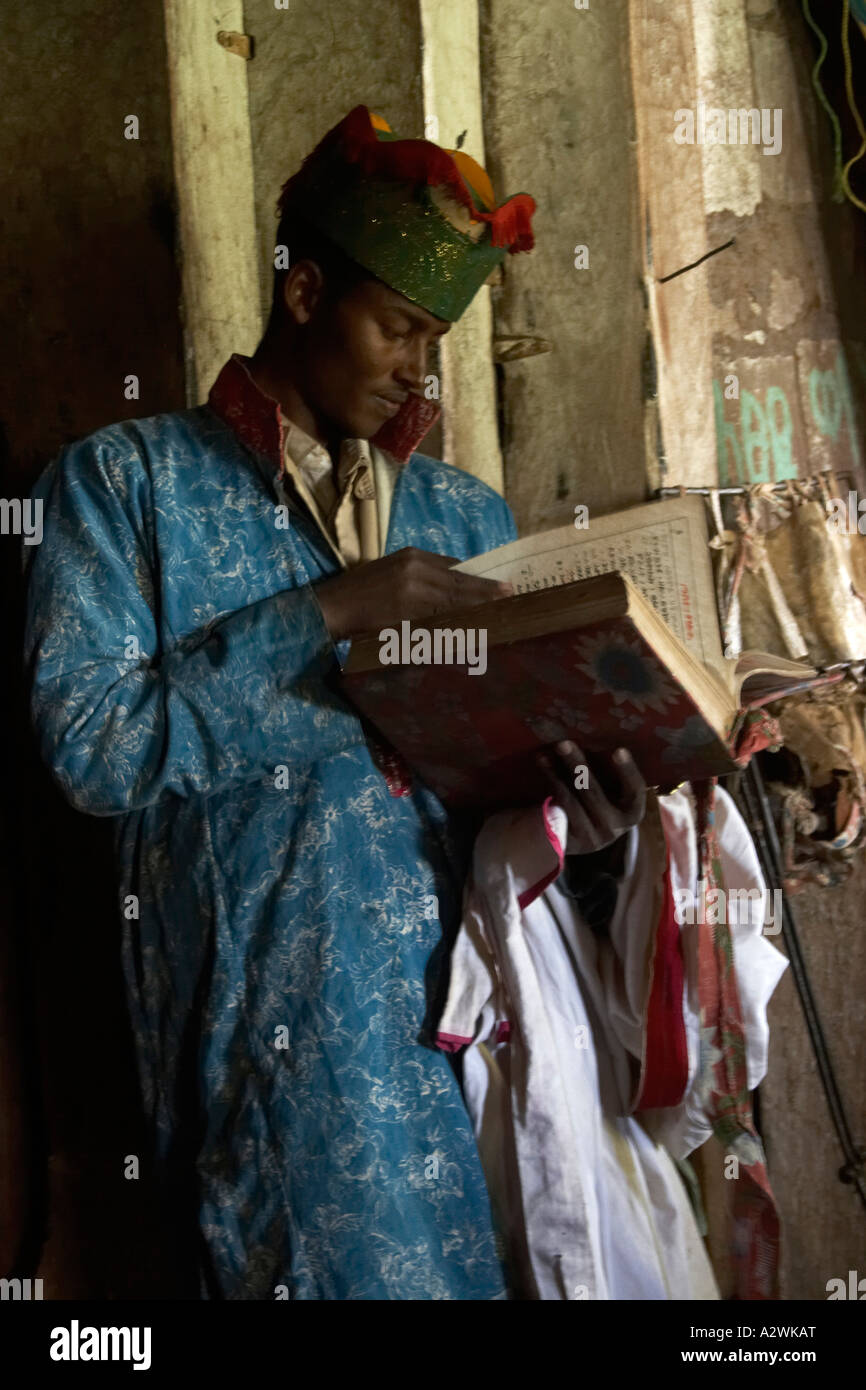 Priest with bible singing in Debre Maryam or Mariam orthodox christian ...