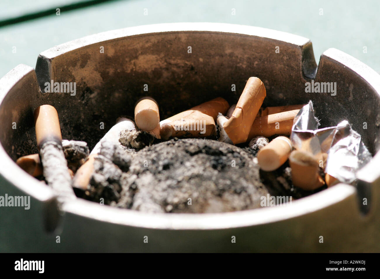 used cigarettes in an ash tray Stock Photo - Alamy