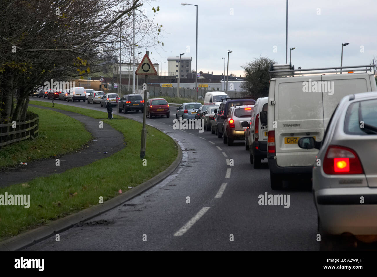 Traffic jams on a main road approaching a roundabout during Christmas ...