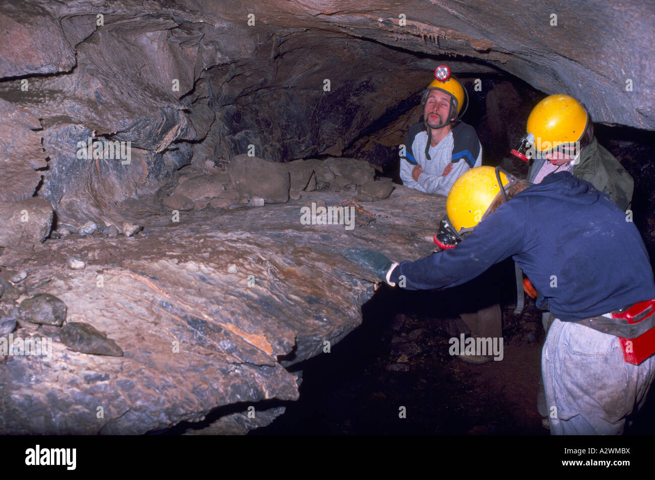 Cavers exploring a Cave in Little Hustan Cave Regional Park on ...