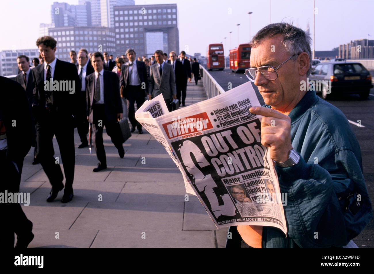 Man reading newspaper on London Bridge, Black Wednesday 16 september ...