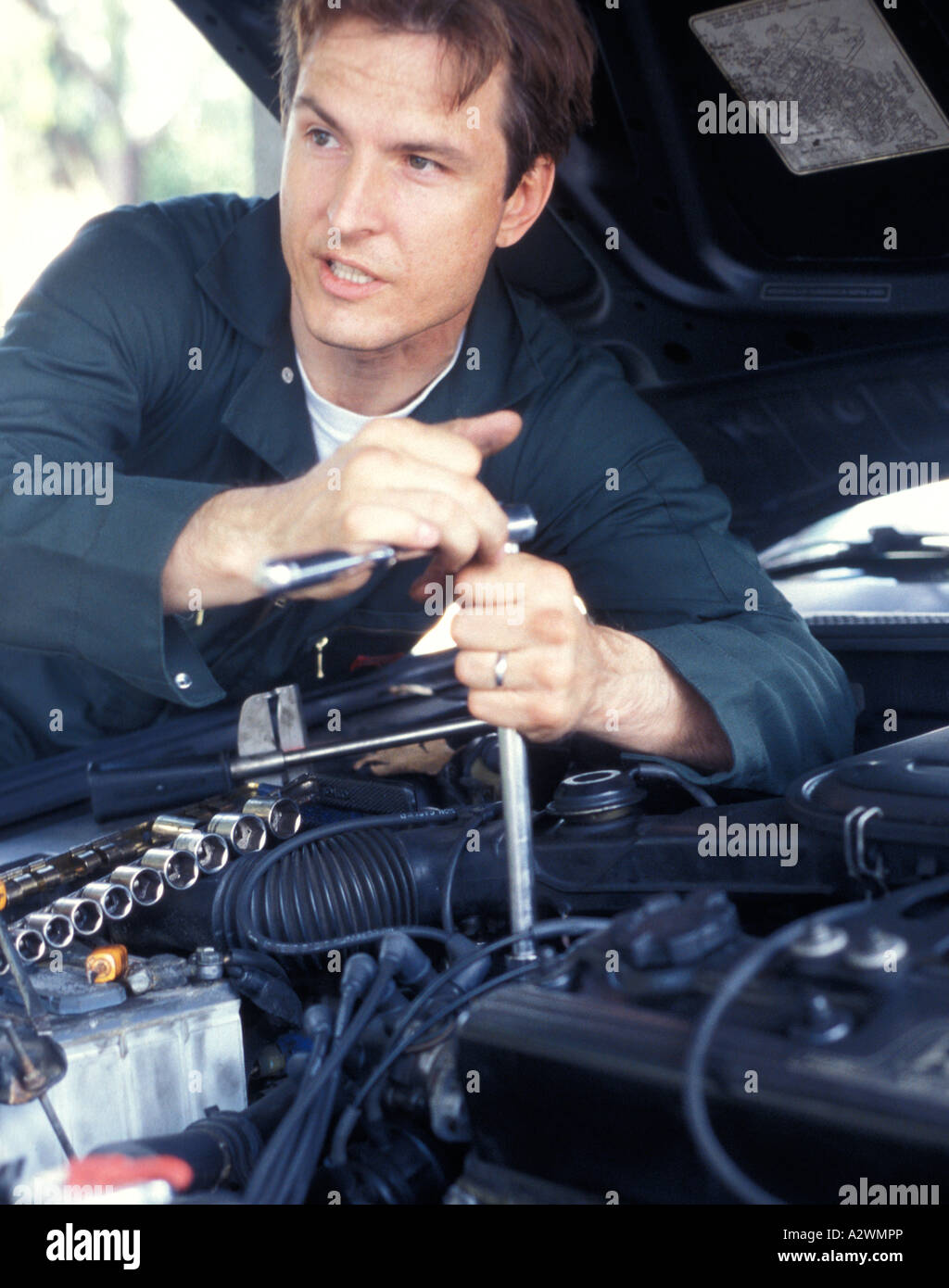 Working on cars photography hi-res stock photography and images - Alamy