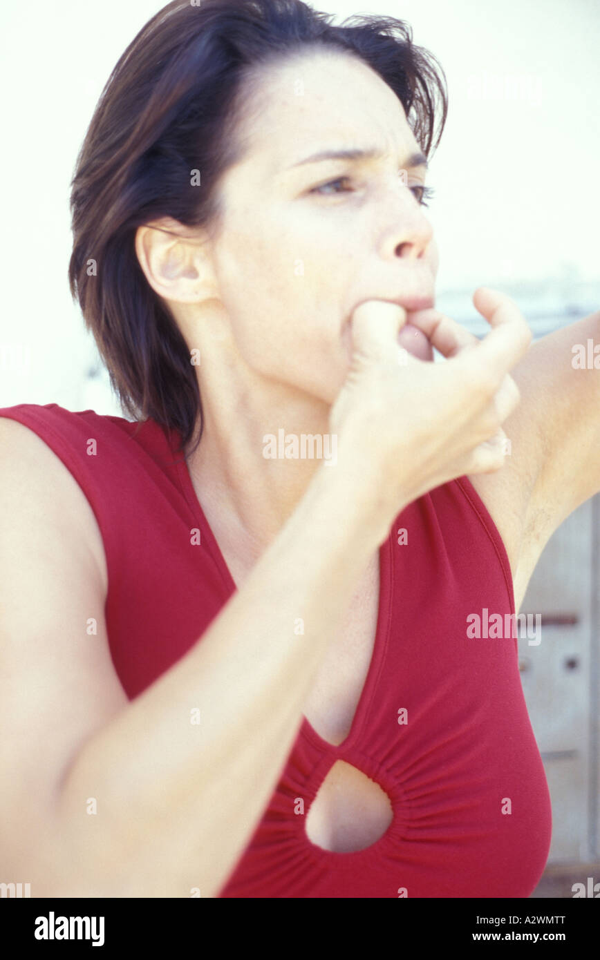 Young woman whistling Stock Photo - Alamy