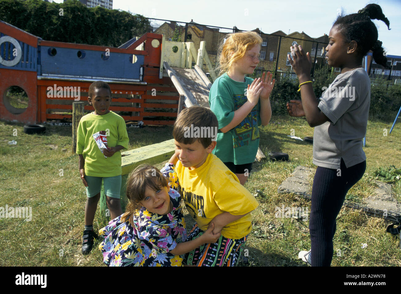 Children playing at Weavers Fields adventure playground Stock Photo - Alamy