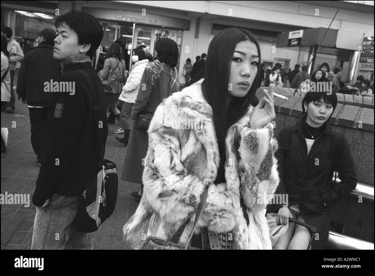 Japanese woman smoking cigarette tokyo hi-res stock photography and ...