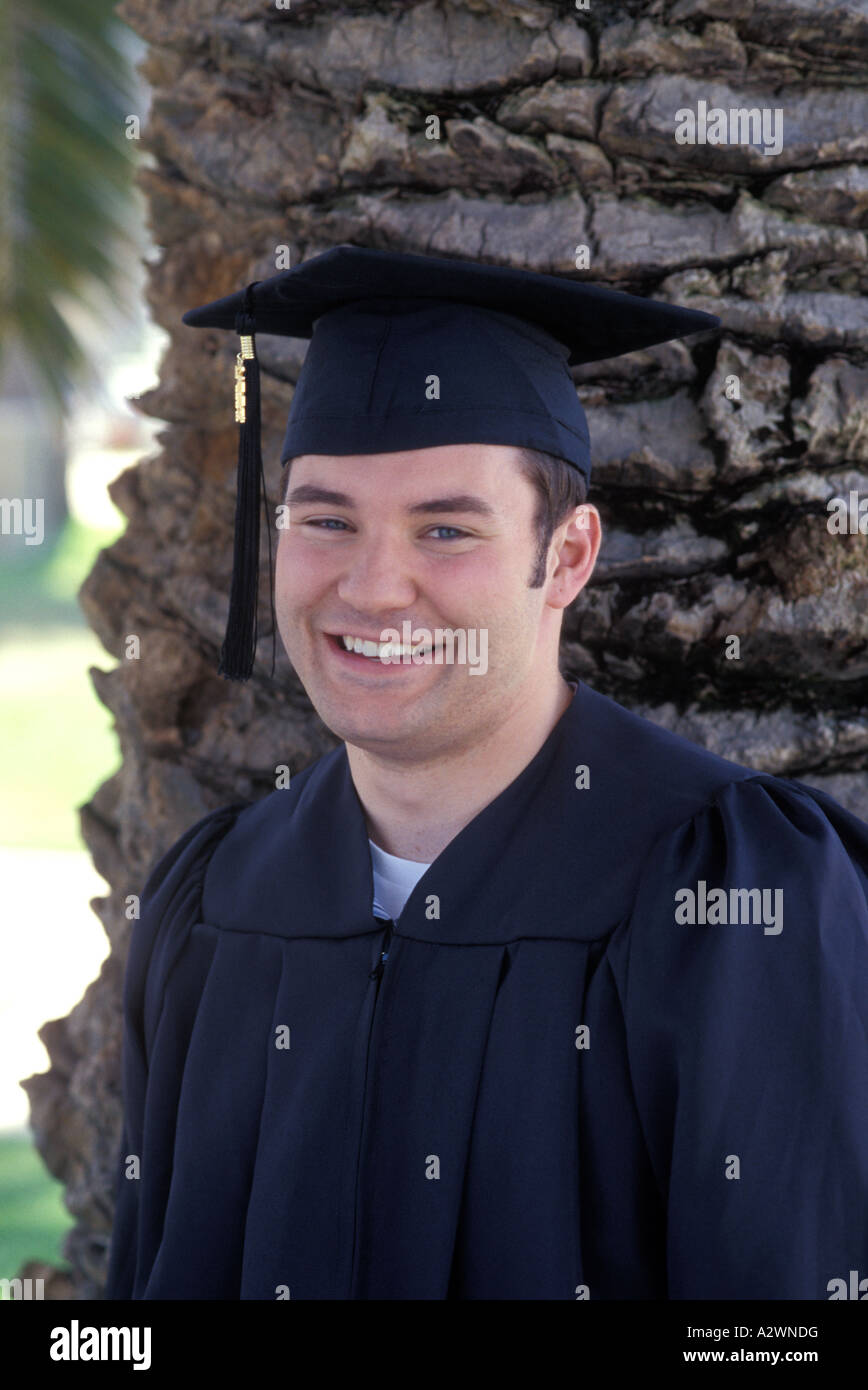 Young man in graduation outfit hi-res stock photography and images - Alamy